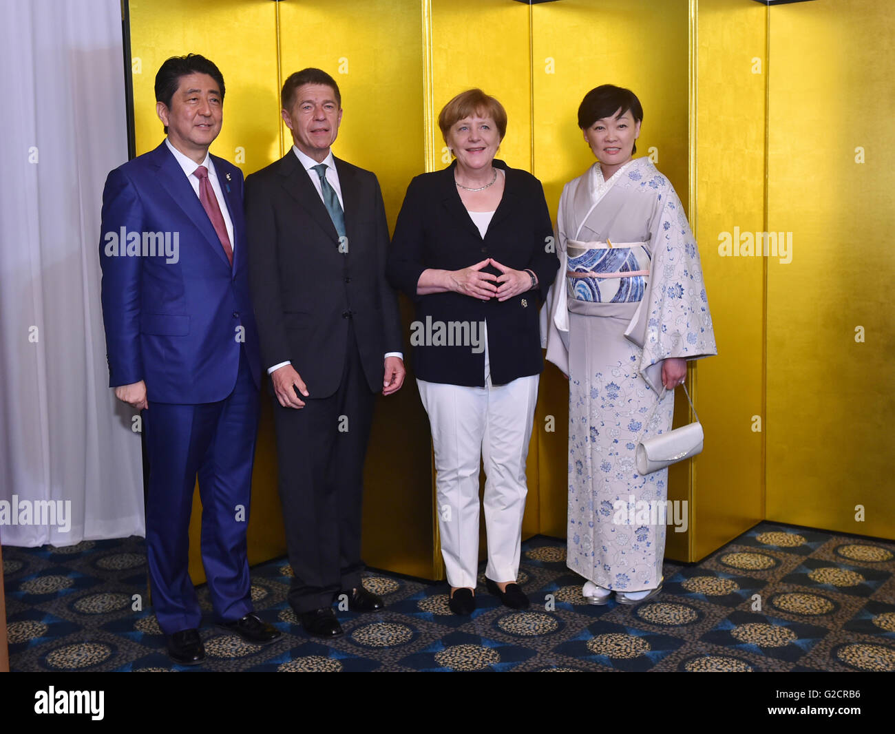 Japanese Prime Minister Shinzo Abe and his wife Akie Abe, stand with ...