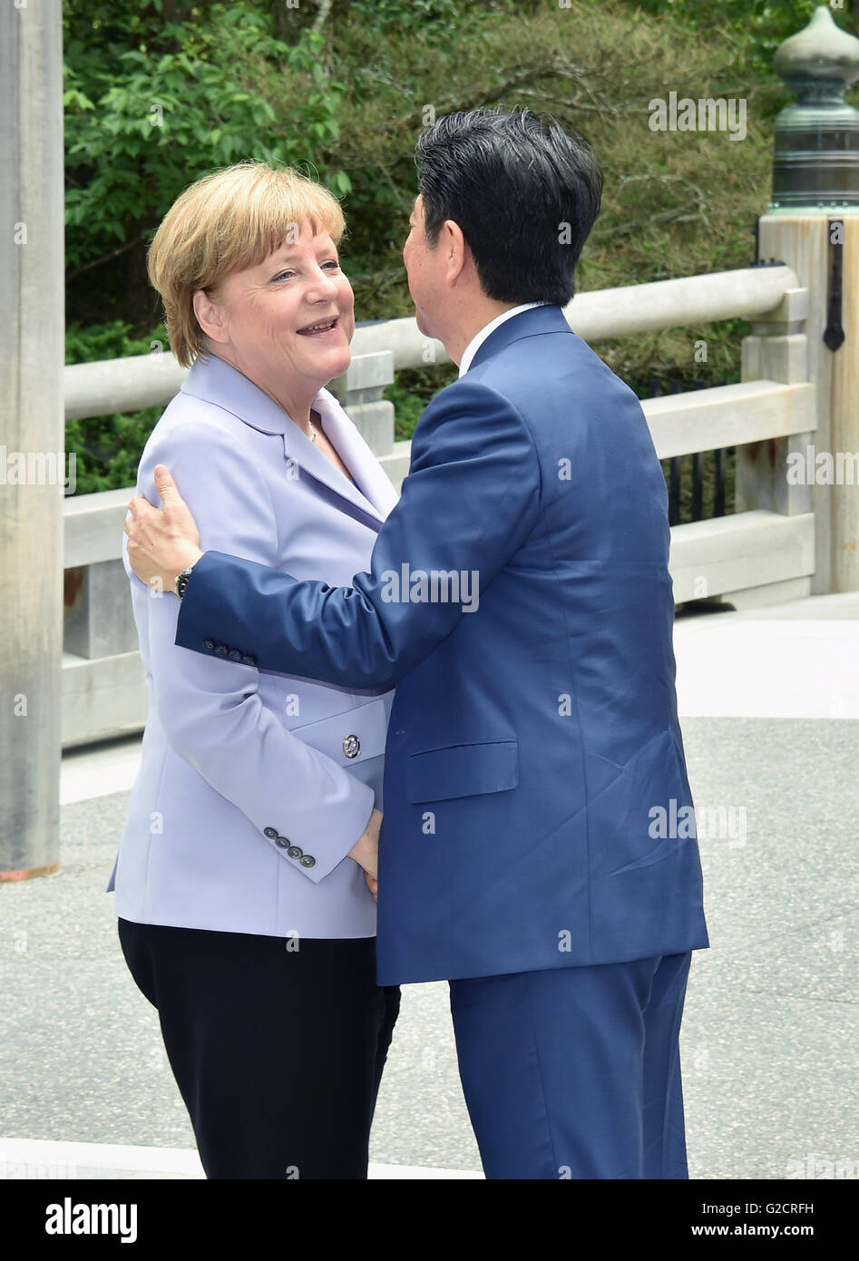 Half length handshake standing embrace vertical hi-res stock ...
