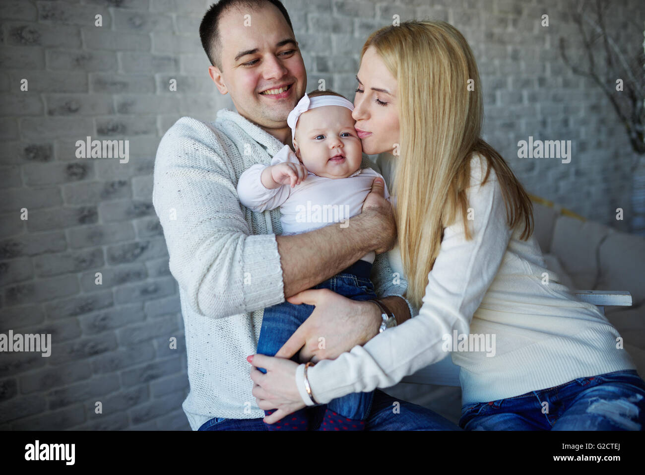 happy father and mother with baby Stock Photo - Alamy