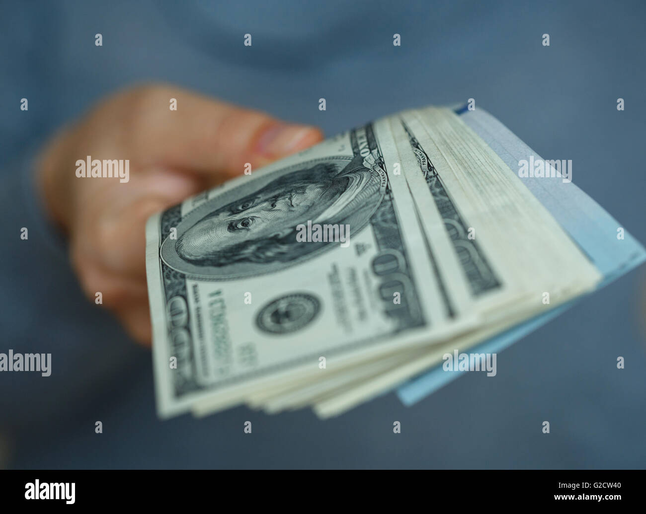 Woman hand with dollar bills in her hand Stock Photo - Alamy