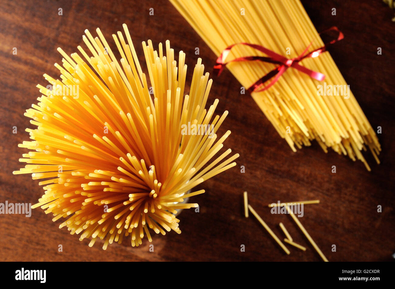 composition of spaghetti on the wood table top view Stock Photo - Alamy