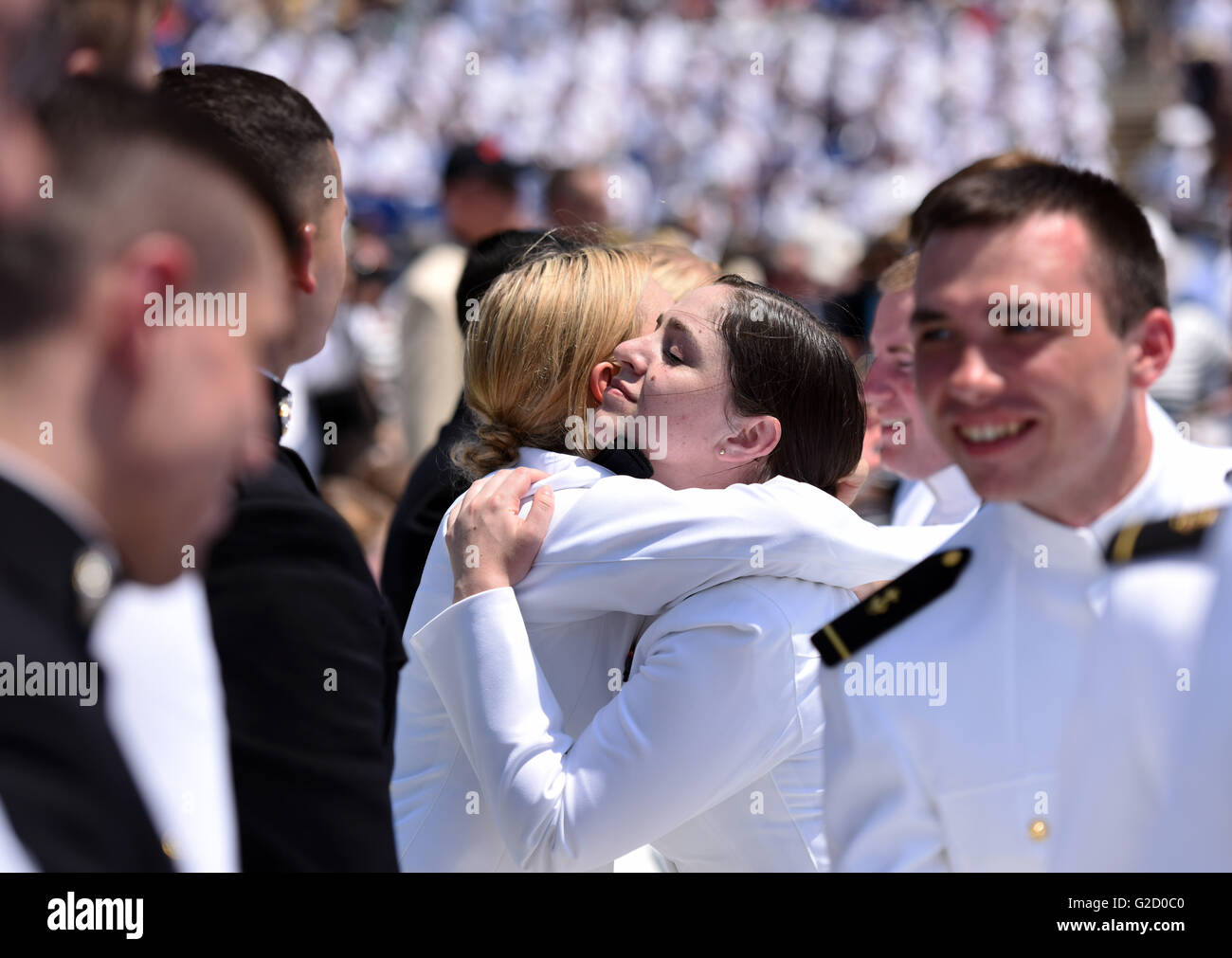 Annapolis, USA. 27th May, 2016. Graduates embrace each other during ...