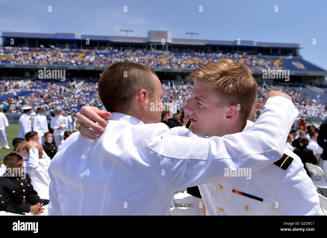 Annapolis, USA. 27th May, 2016. Graduates embrace each other during ...