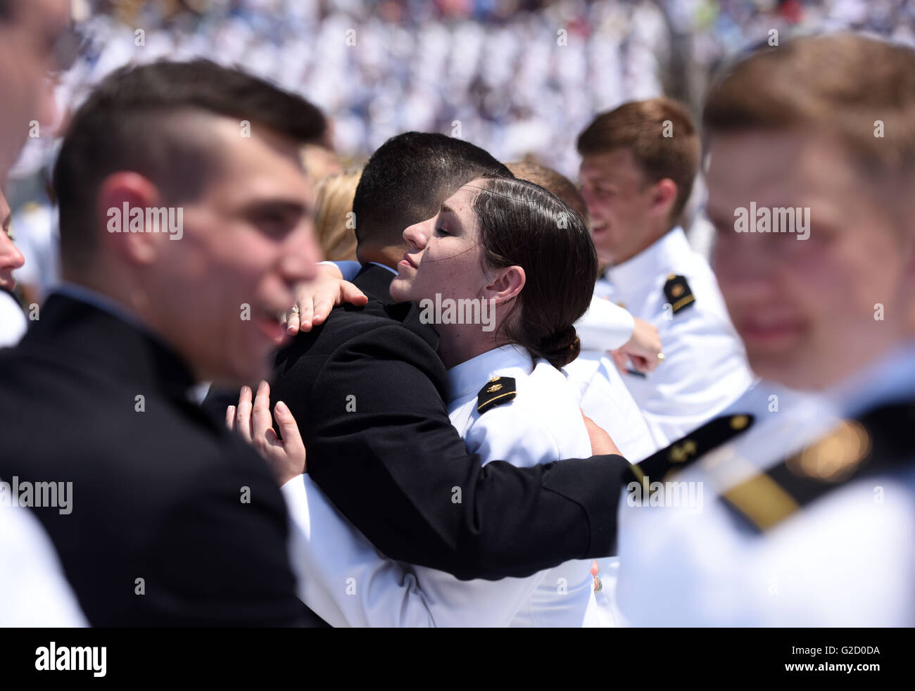 Annapolis, USA. 27th May, 2016. Graduates embrace each other during ...
