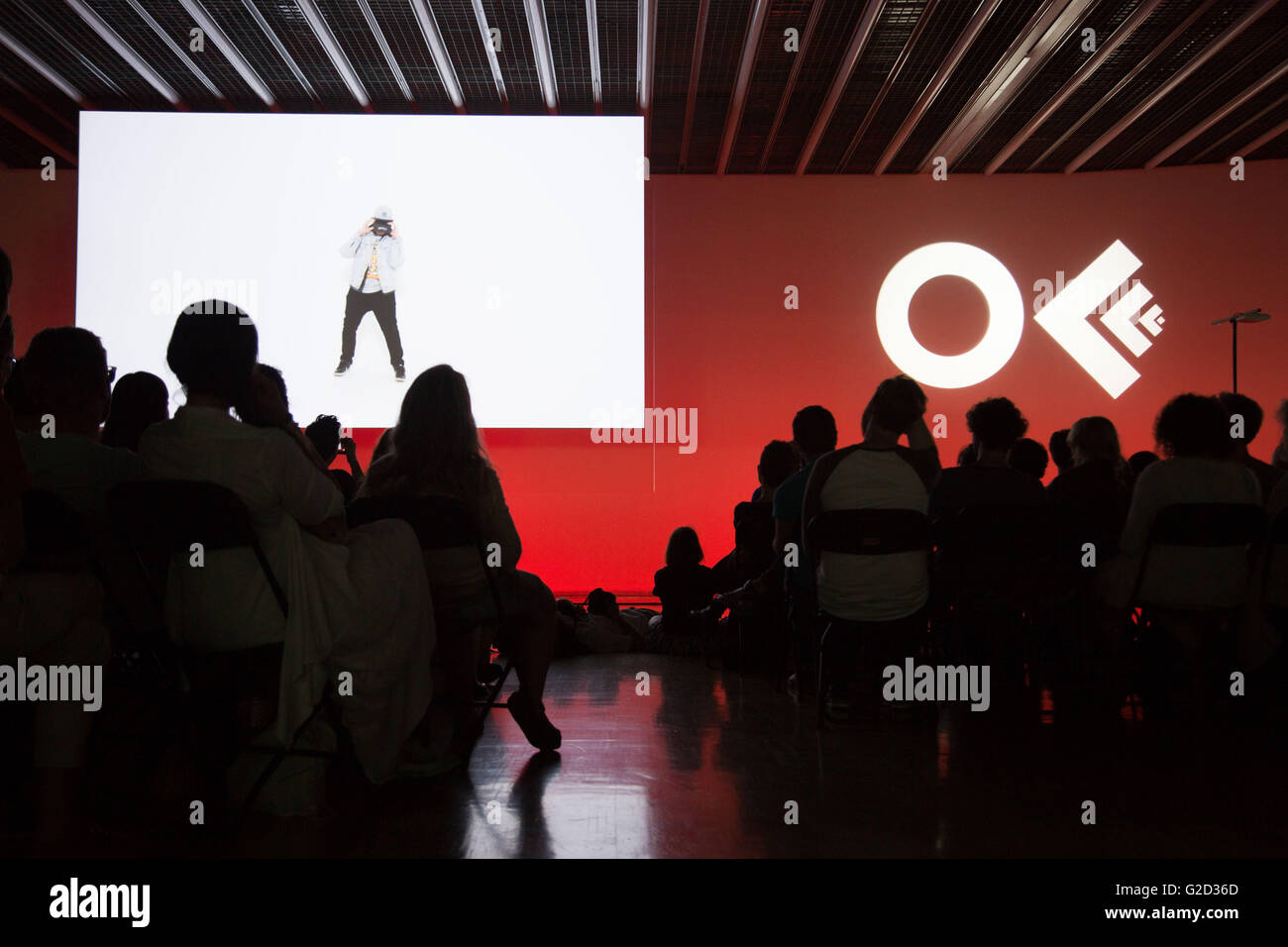 Beautiful silhouettes against the pink main stage background at Museu ...