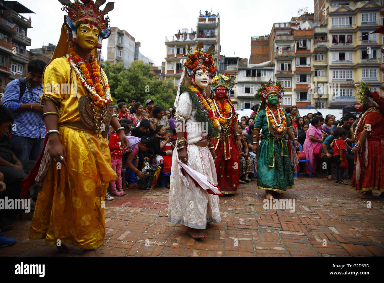 Kathmandu, Nepal. 28th May, 2016. People dressed as deities perform a ...
