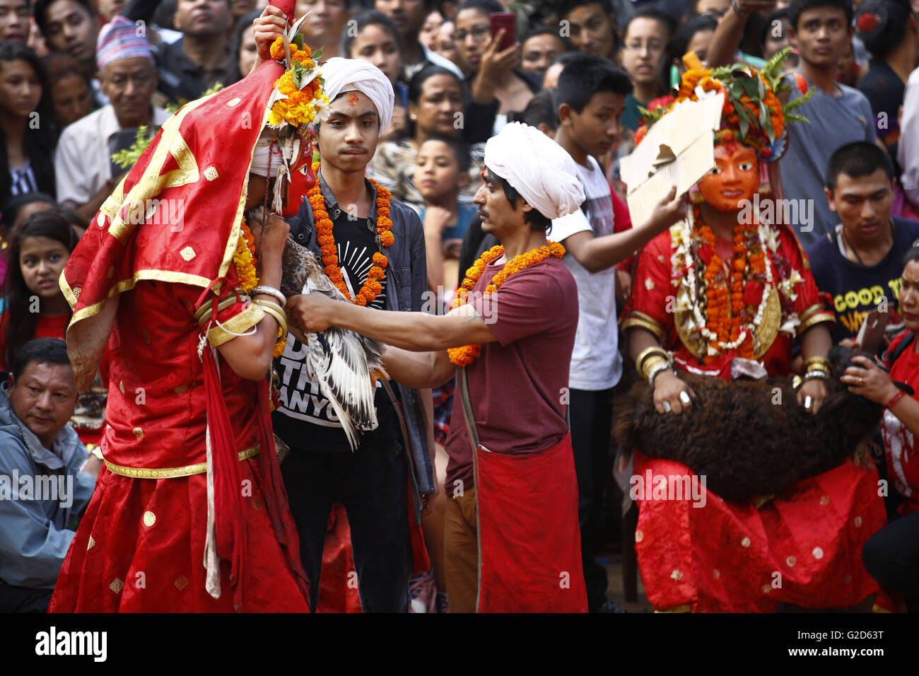Kathmandu, Nepal. 28th May, 2016. People dressed as deities drink blood ...