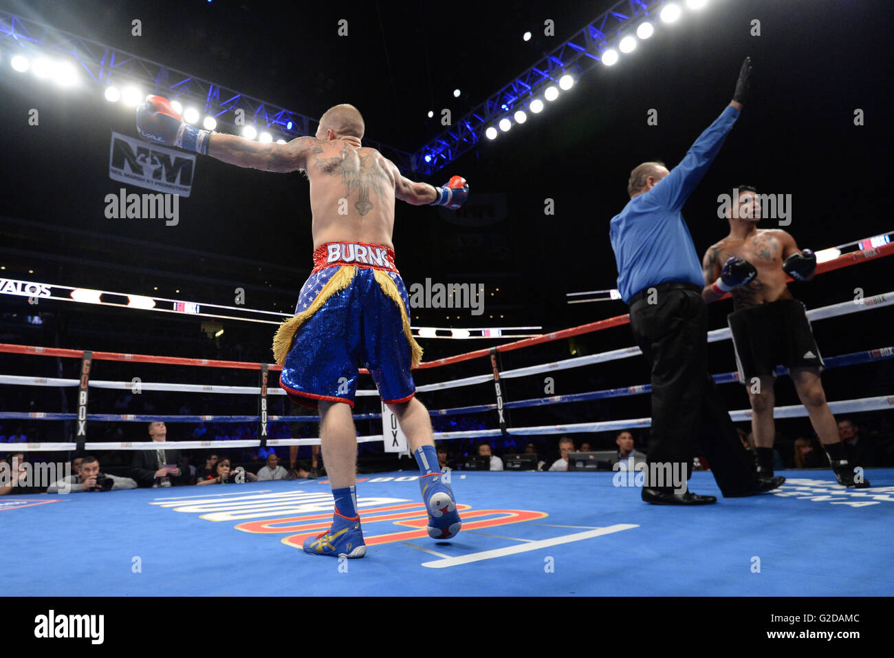 May 28, 2016; Clay Burns (blue trunks) celebrates a victory over Isaac ...