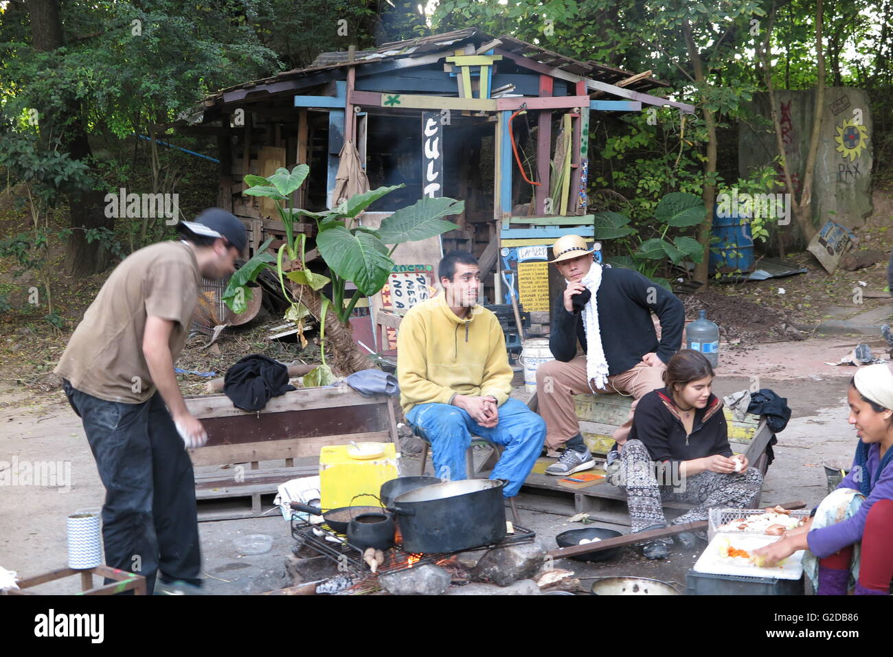 Buenos Aires, Argentina. 24th May, 2016. Settlers sit at a communal ...