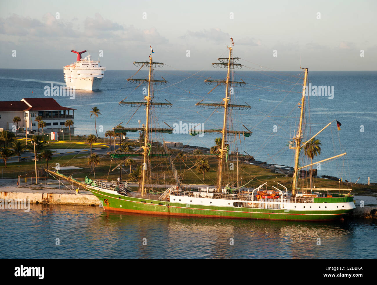 The view of the old style ship and a cruise liner that arriving to ...