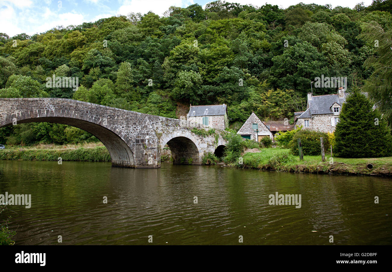 Old Stone Bridge over small River at Lehon, Brittany, France Stock ...