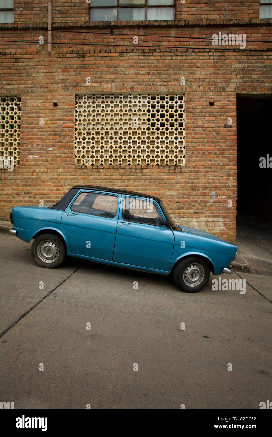 Small Blue Car Parked on Steep Road, San Gil, Colombia Stock Photo - Alamy