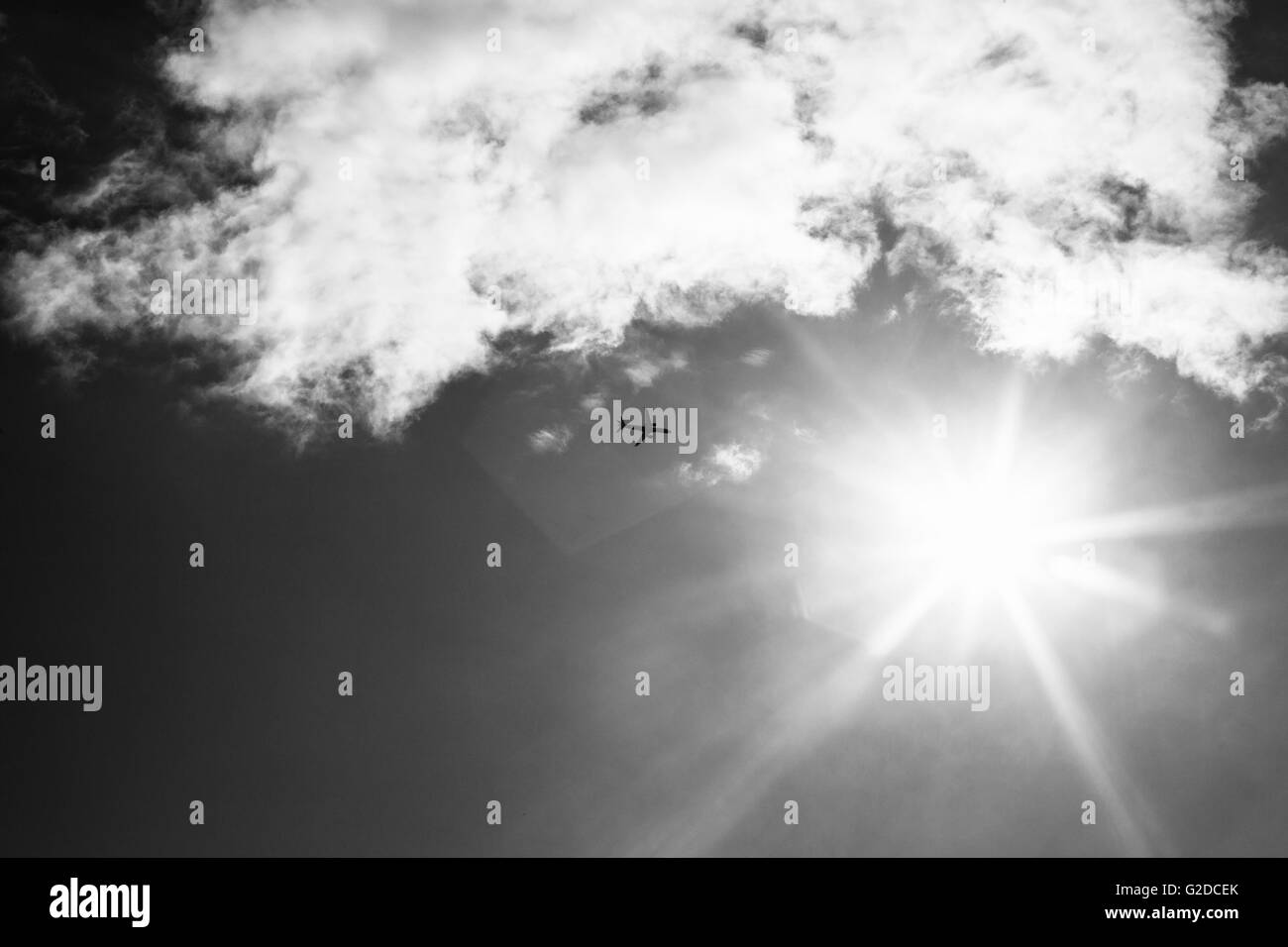 Plane flying towards clouds hi-res stock photography and images - Alamy