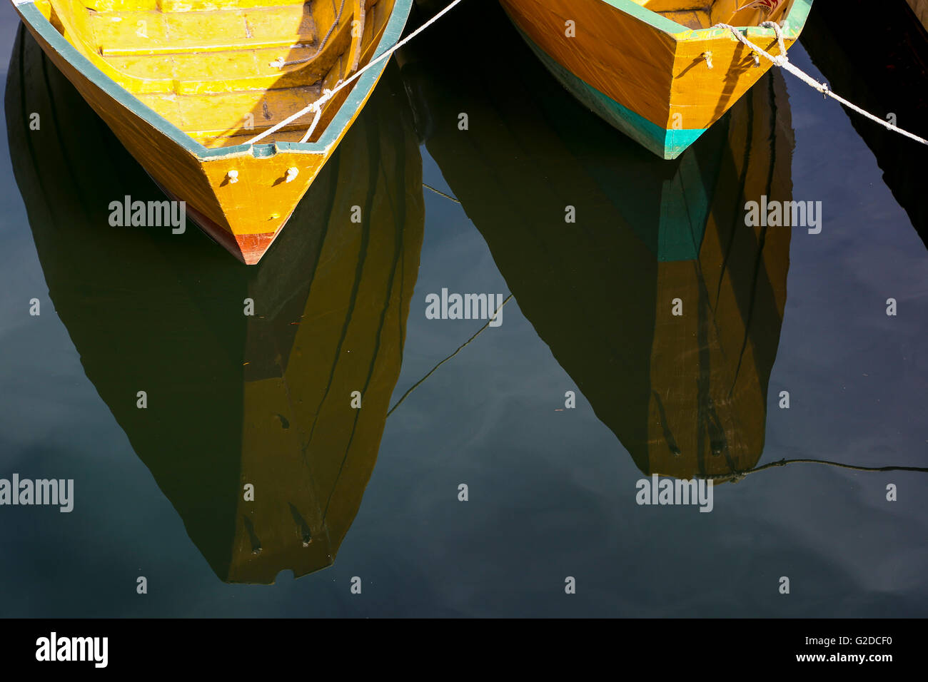 Reflection of Two Boats in Water Stock Photo - Alamy