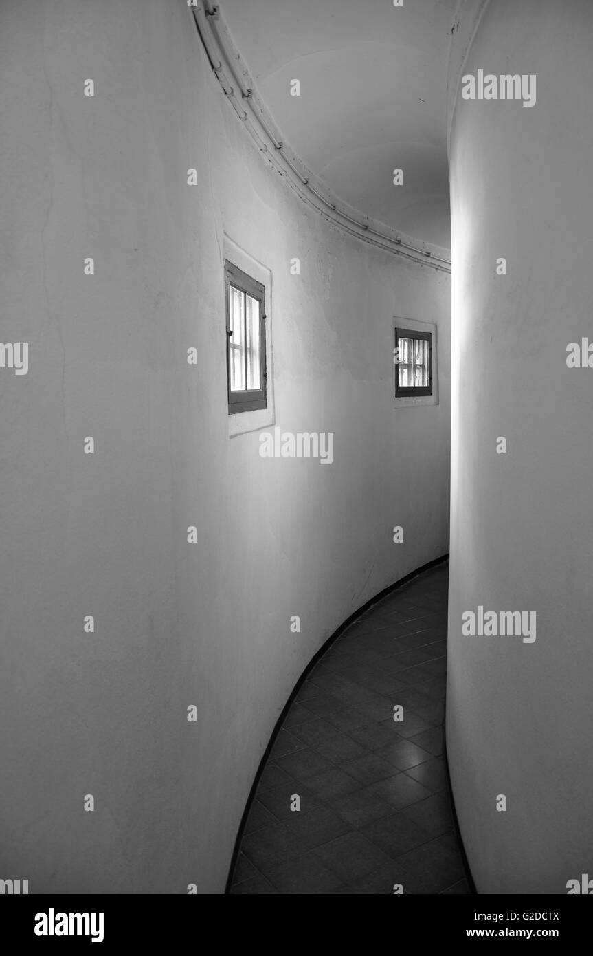 Curved Narrow Passageway with Two Windows Stock Photo - Alamy