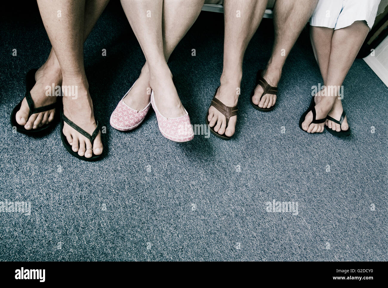 Four Pairs of Feet Stock Photo - Alamy