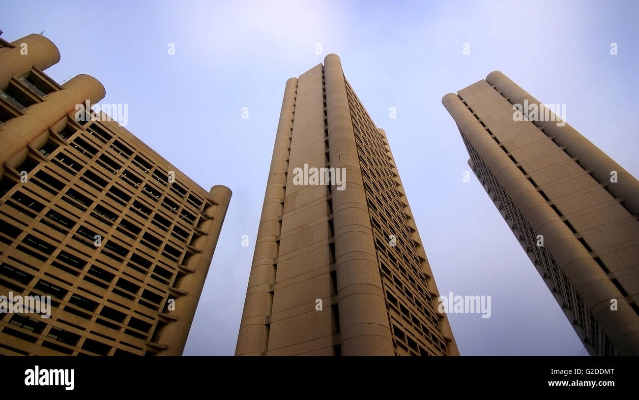 Three modern sky-scrapers strongly set side-by-side Stock Photo - Alamy