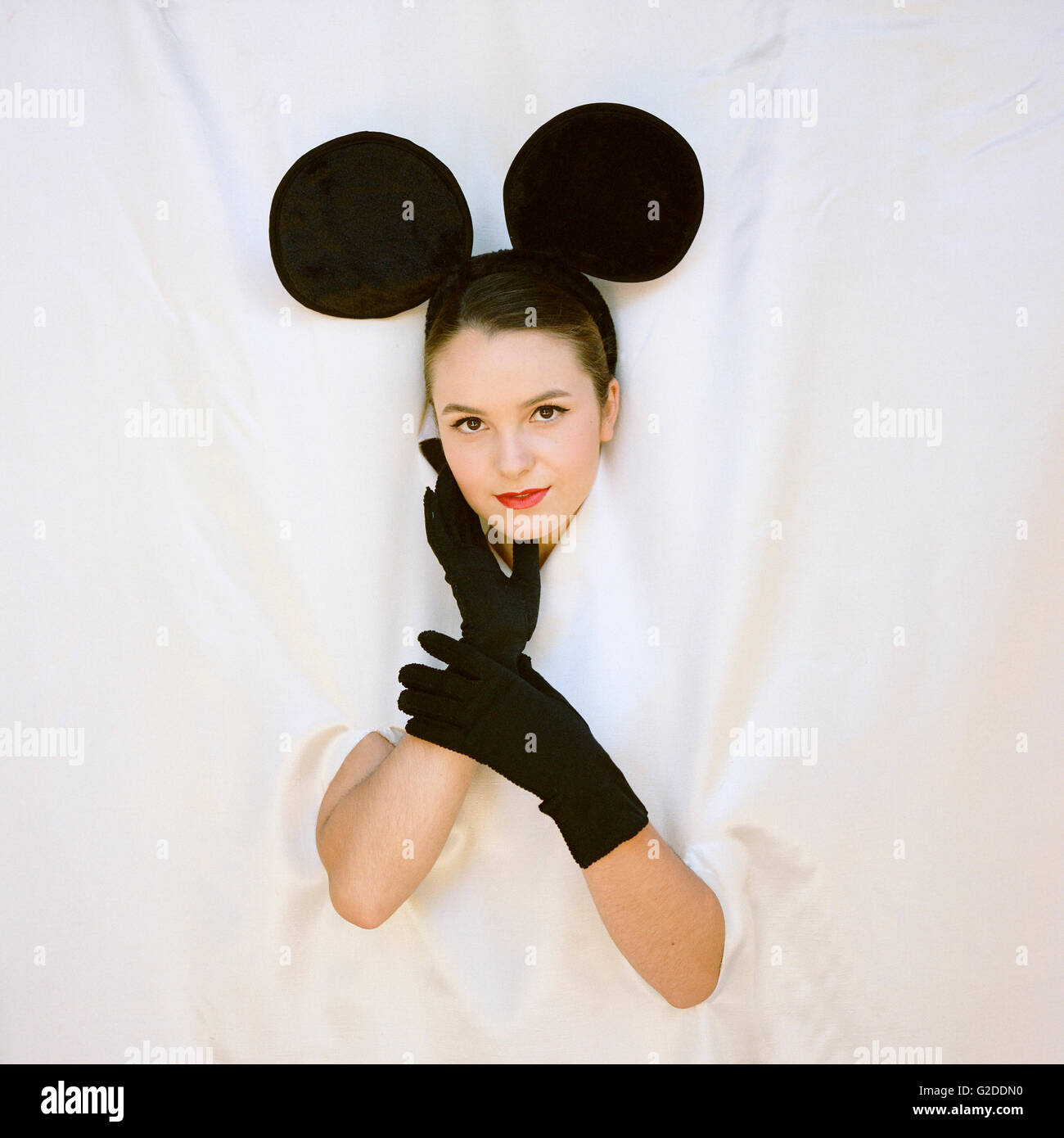 Teenage Girl Wearing Mouse Ears and Long Black Gloves Stock Photo - Alamy