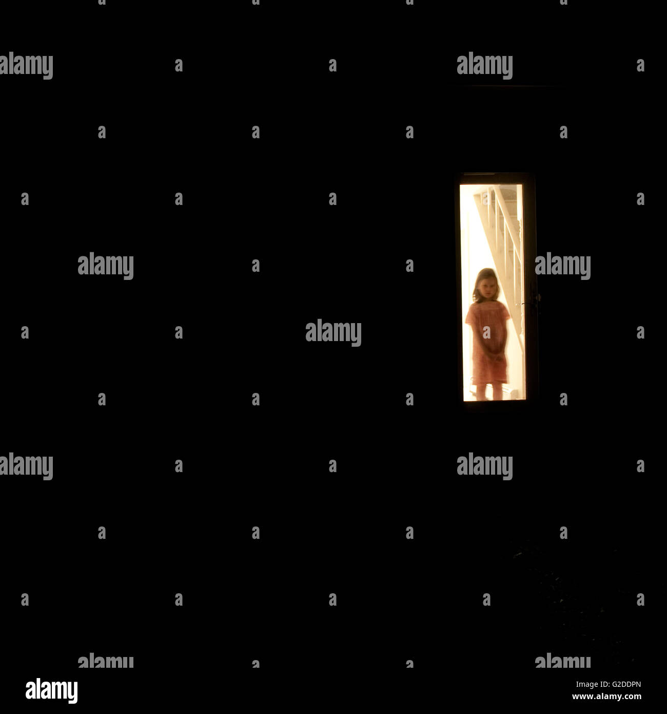 Girl Waiting Behind Screen Door at Night Stock Photo - Alamy
