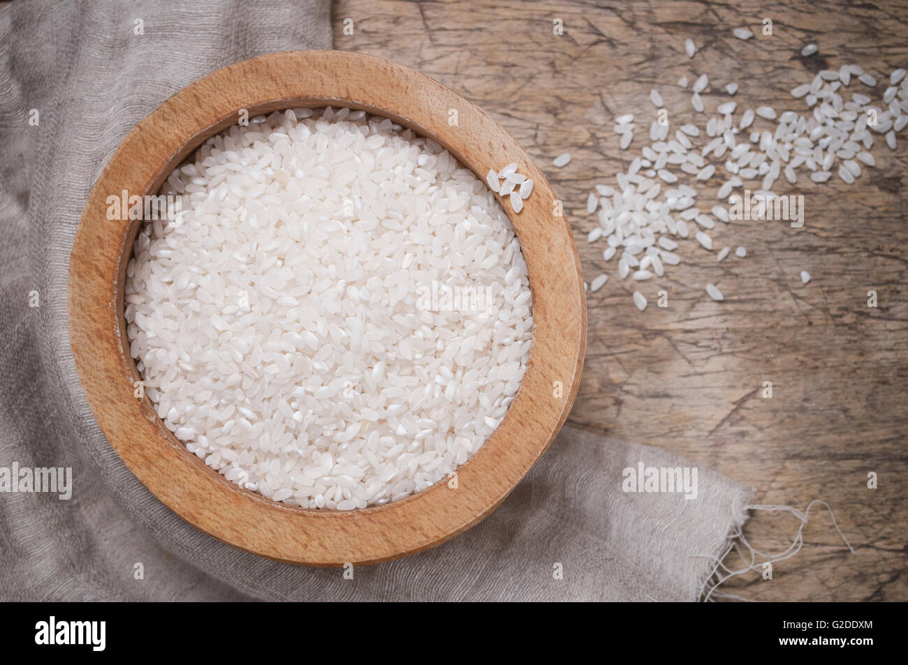 Rice in wooden bowl Stock Photo - Alamy