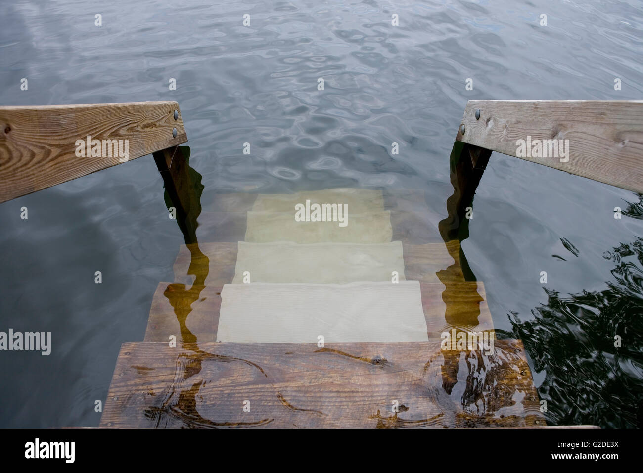 Wooden Steps Submerged in Flooding Water Stock Photo - Alamy