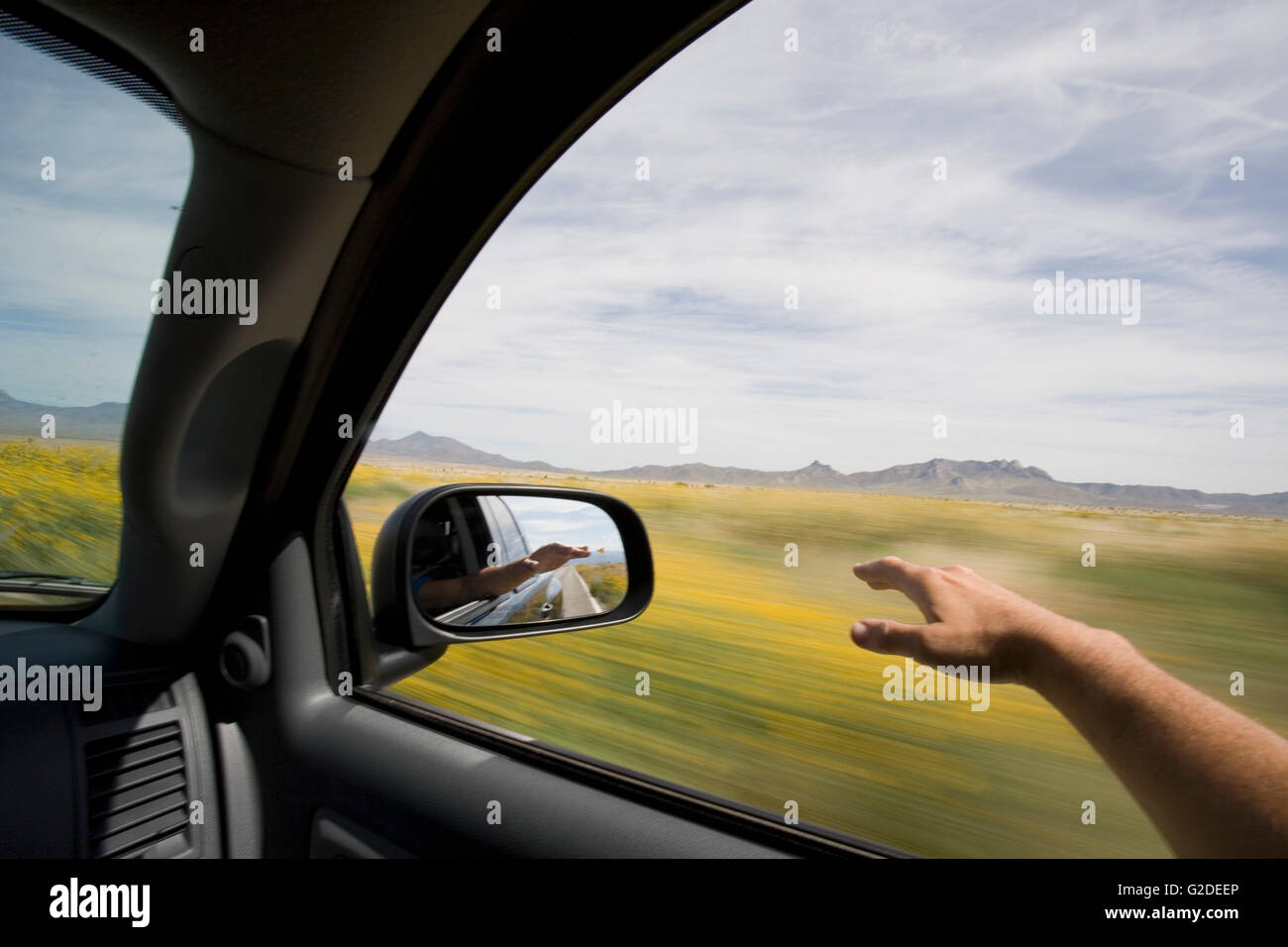 Arm out window driving hi-res stock photography and images - Alamy