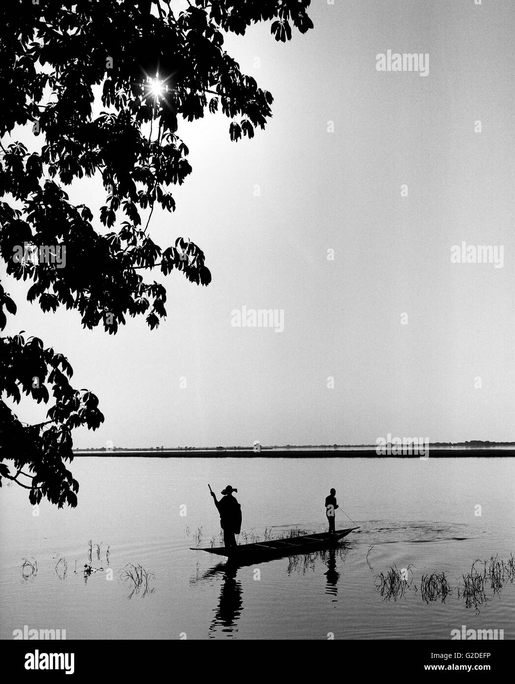 Canoes on river in Black and White Stock Photos & Images - Alamy