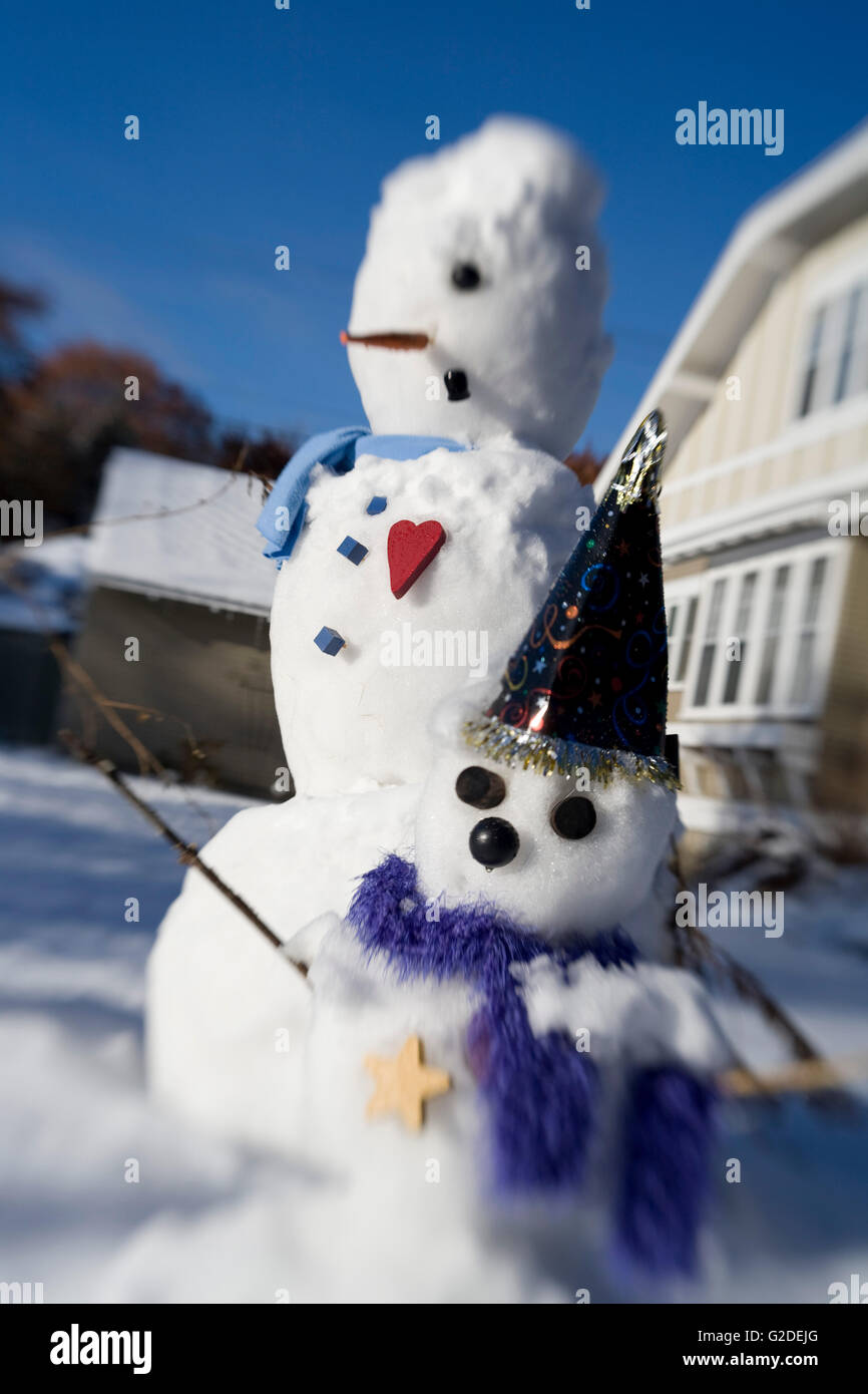 Tall and Short Decorated Snowmen Stock Photo - Alamy