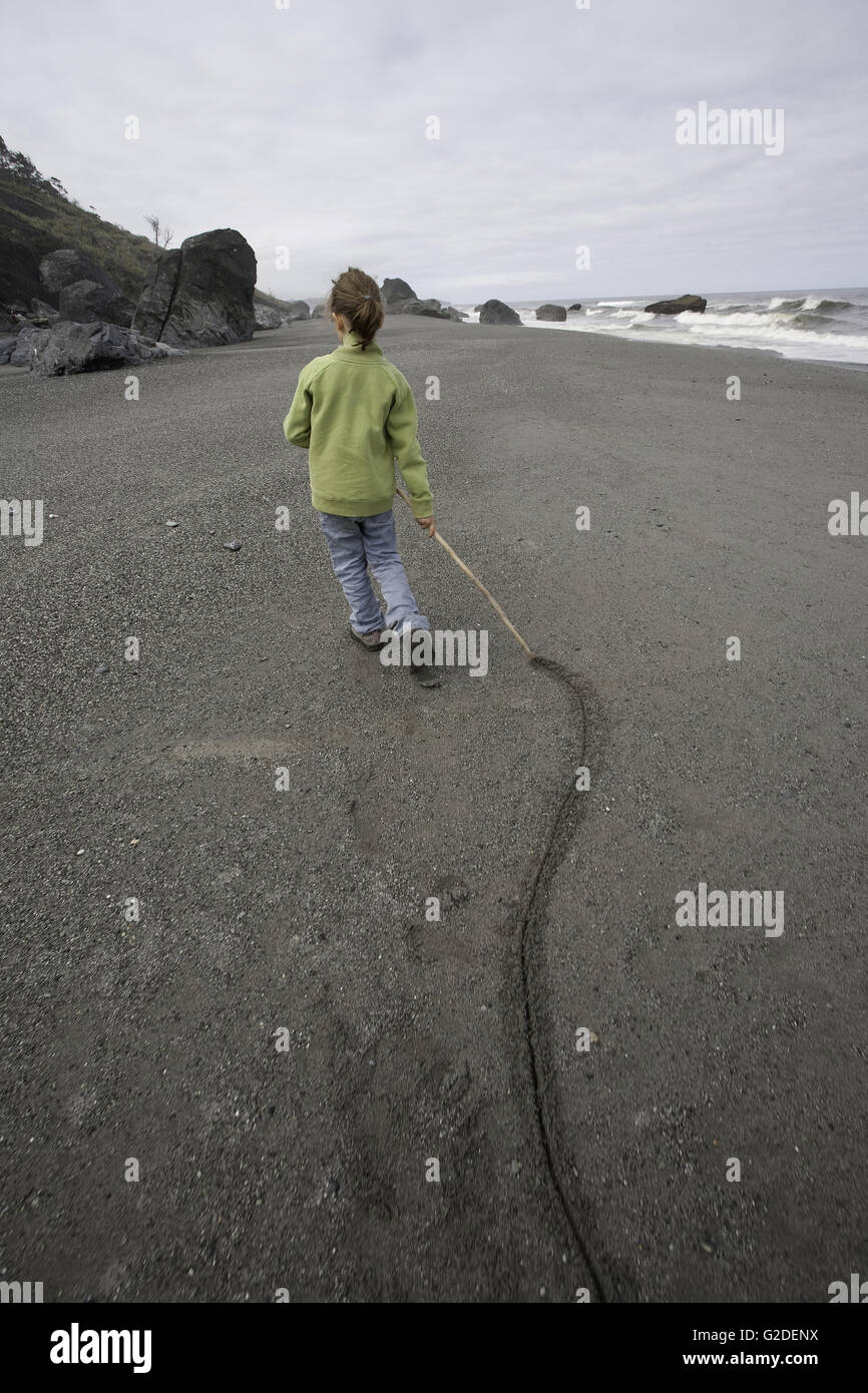 Child walking by water california hi-res stock photography and images ...