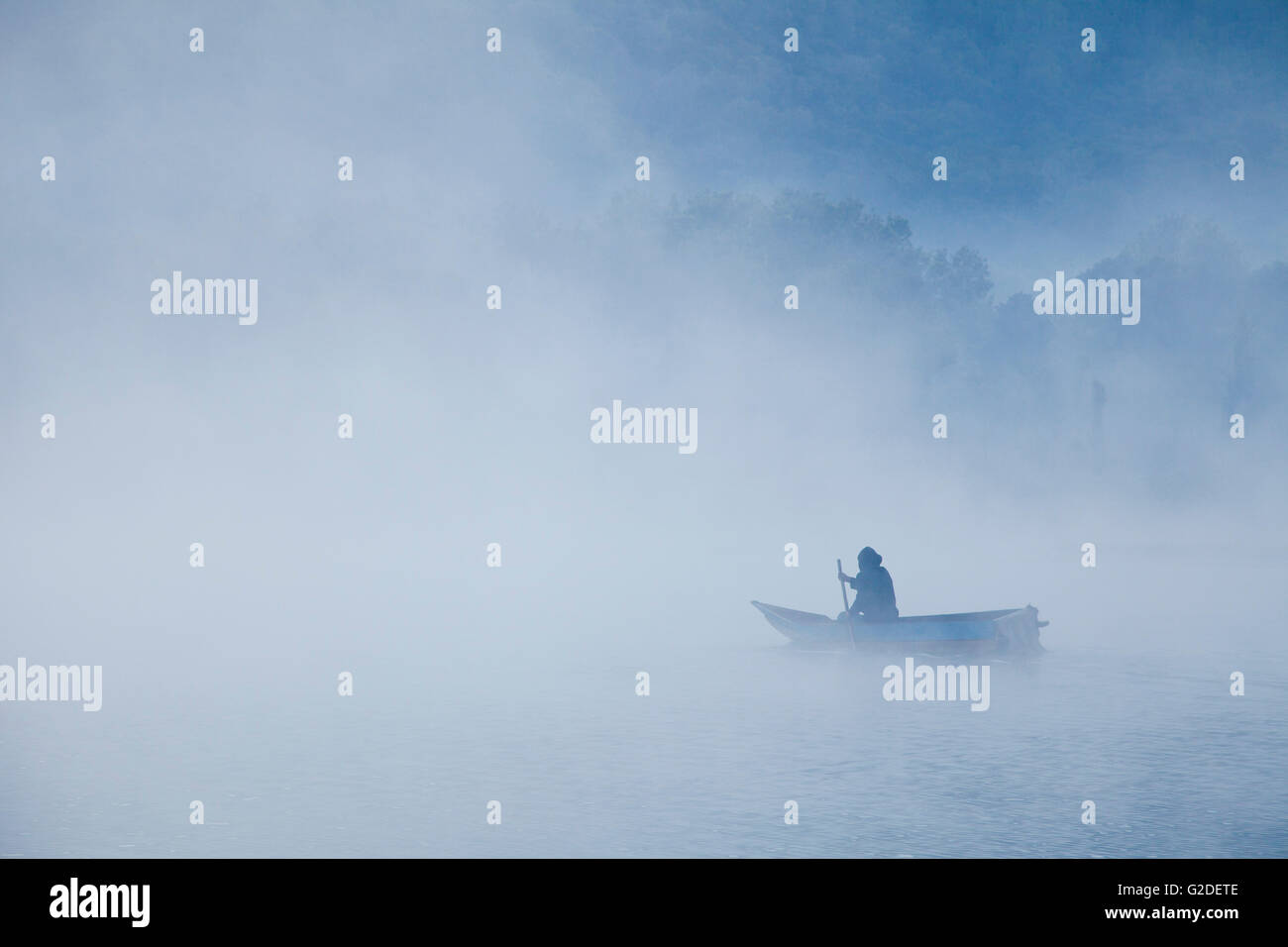 Rowboat fog lake hi-res stock photography and images - Alamy