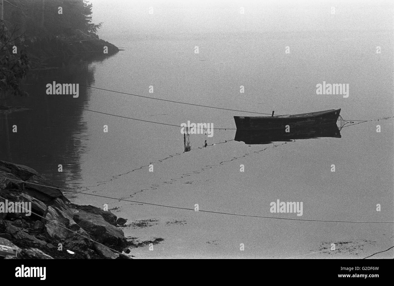 Small boat water in Black and White Stock Photos & Images - Alamy