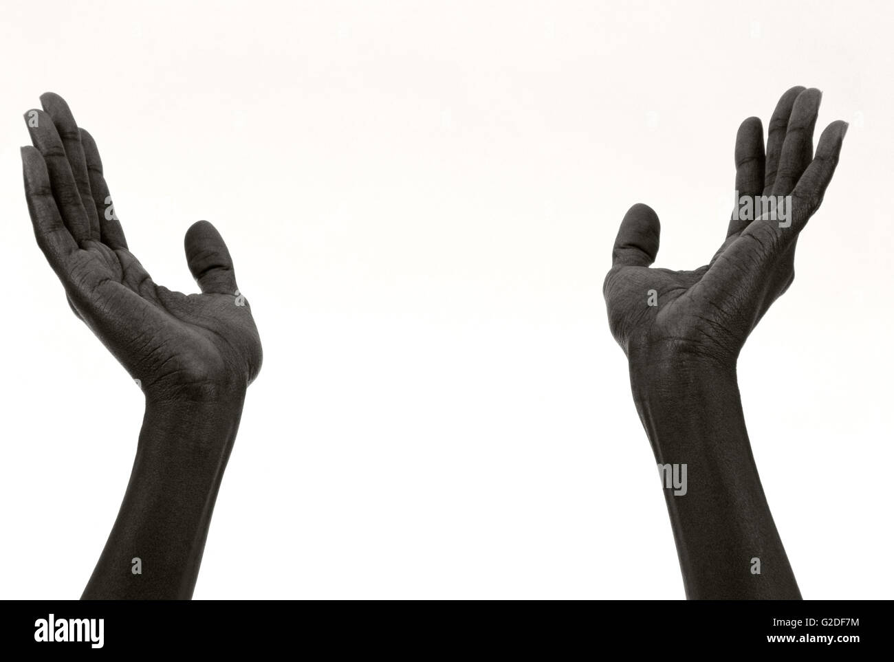 Upraised Arms and Hands Stock Photo - Alamy