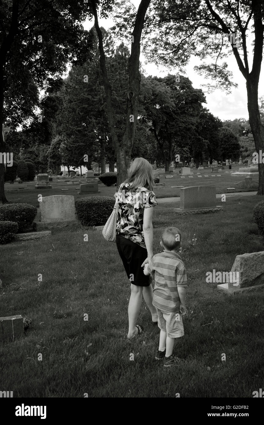 Woman in cemetery hi-res stock photography and images - Alamy