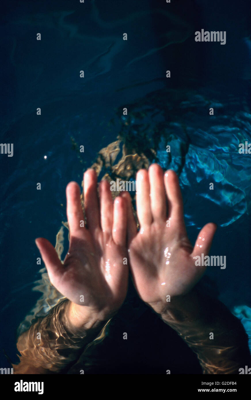 Hands in Water Stock Photo - Alamy