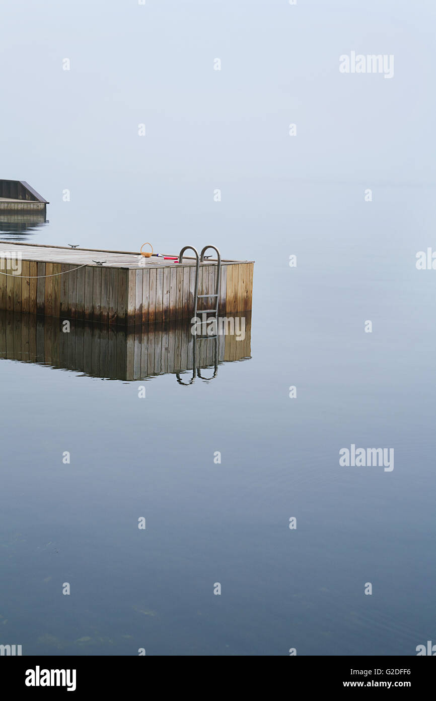 Dock lake on foggy hi-res stock photography and images - Alamy