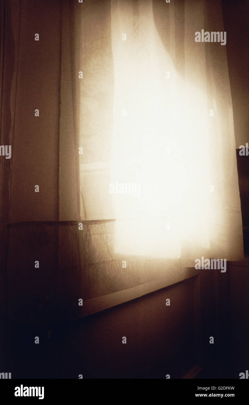 Curtains and lights inside windows hi-res stock photography and images ...