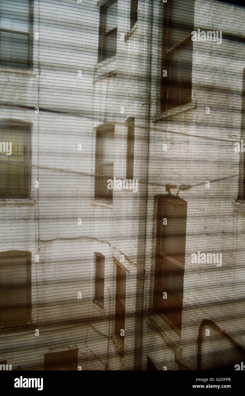 Urban Apartment Building Courtyard Viewed Through Shaded Window Stock ...