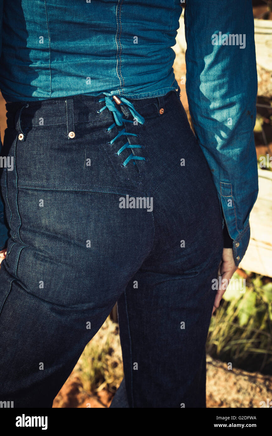 Rear View Portrait of Woman Wearing Vintage Denim Shirt and Lace-Up ...