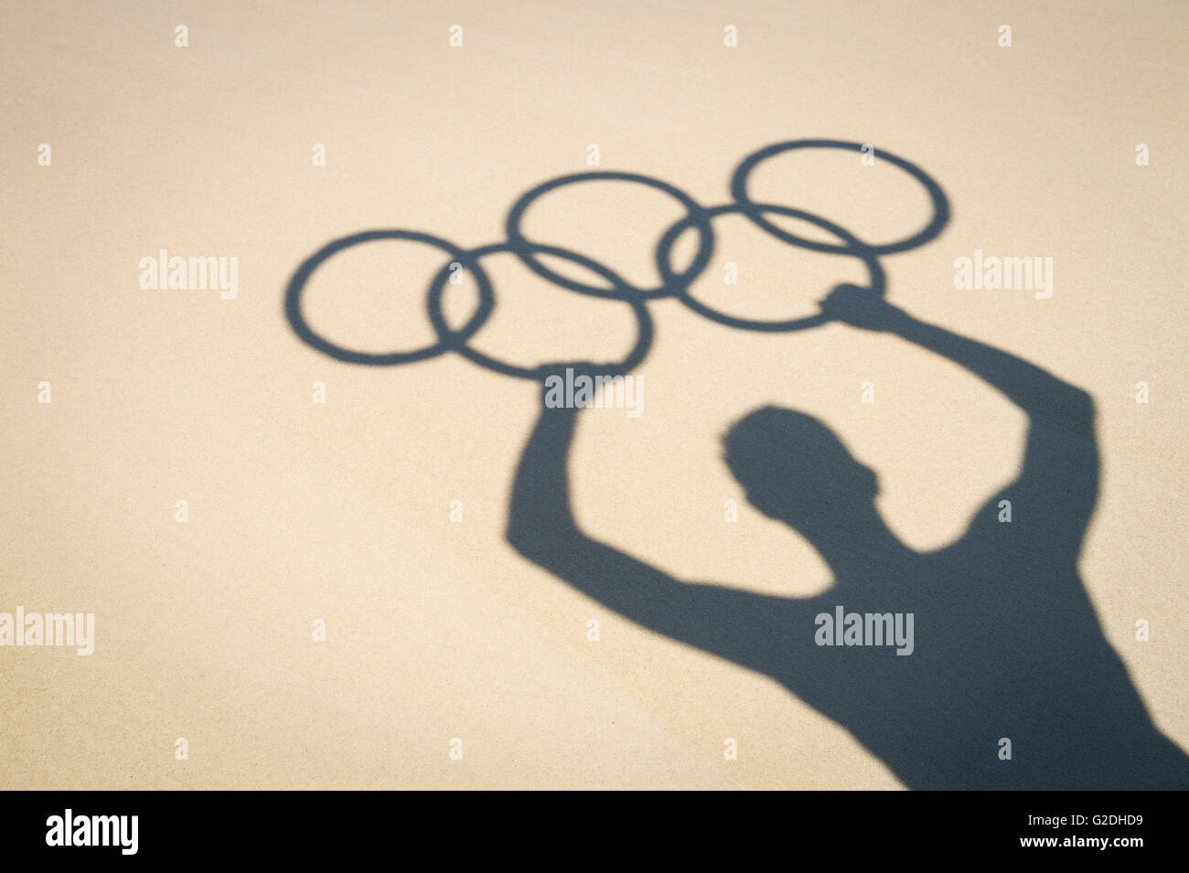 RIO DE JANEIRO - MARCH 20, 2016: Shadow silhouette on the sand of a man ...