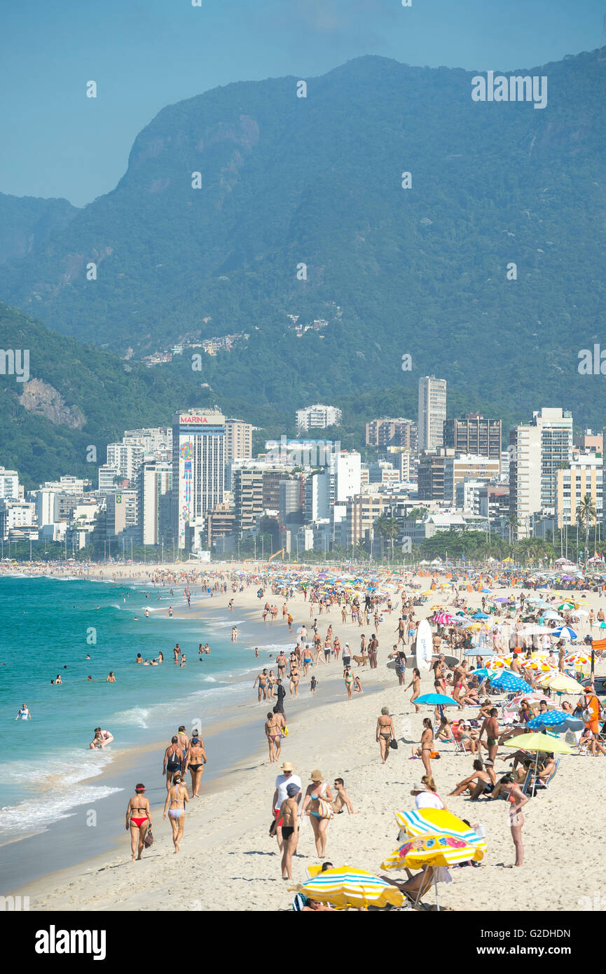 RIO DE JANEIRO - MARCH 15, 2016: Beachgoers gather on Ipanema Beach on ...