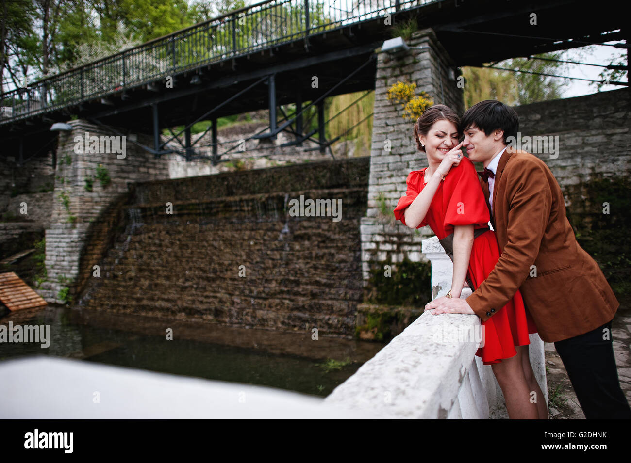 Couple hugging in love background water dam. Stylish man at velvet ...