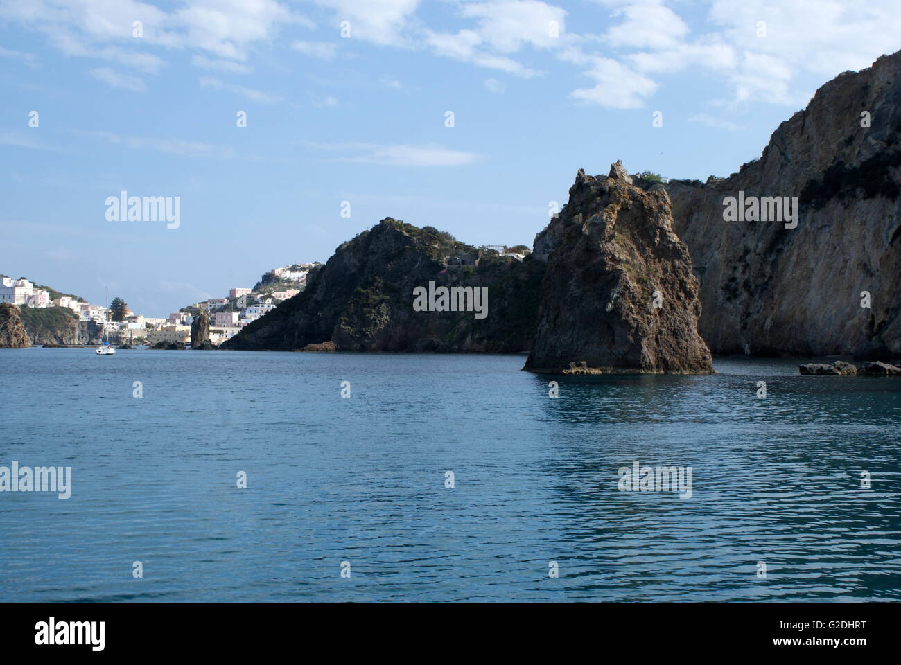Looking back at Ponza town hiding behind the rocks from Cala di ...