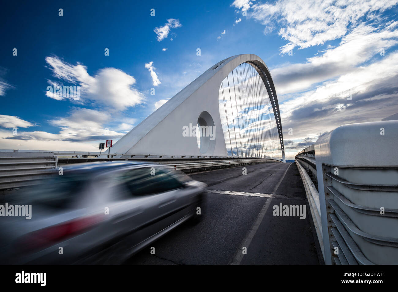fast passing car on highway Santiago Calatrava bridge in Reggio Emilia ...