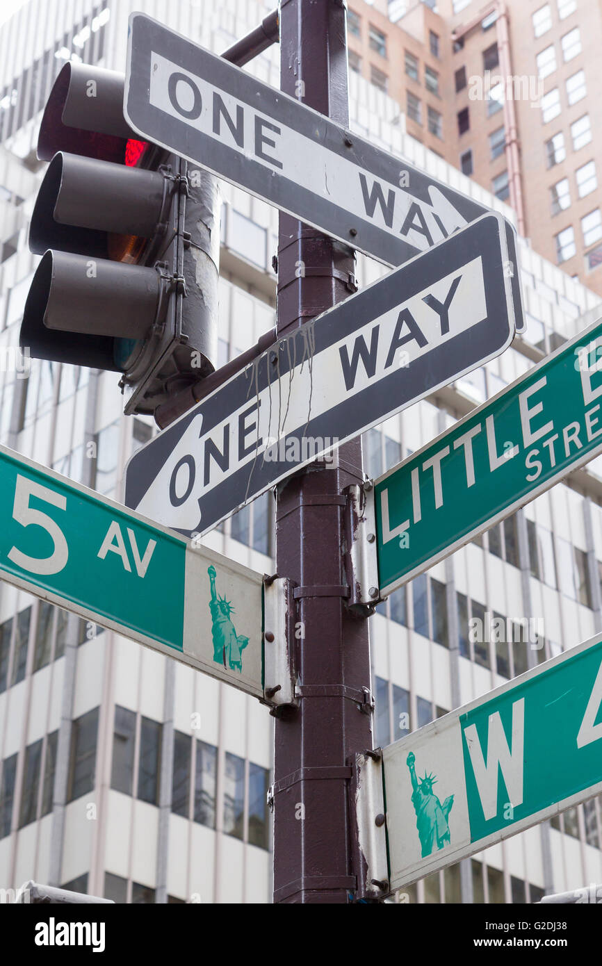 Street signs for Fifth Avenue and Liitle Brazil street in Manhattan ...
