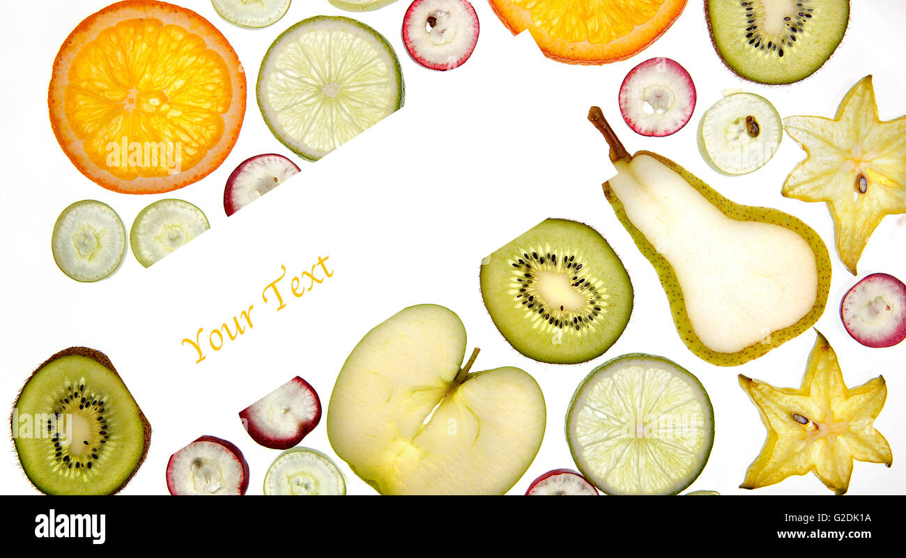 Variety of fresh ripe fruits sliced on white background Stock Photo - Alamy