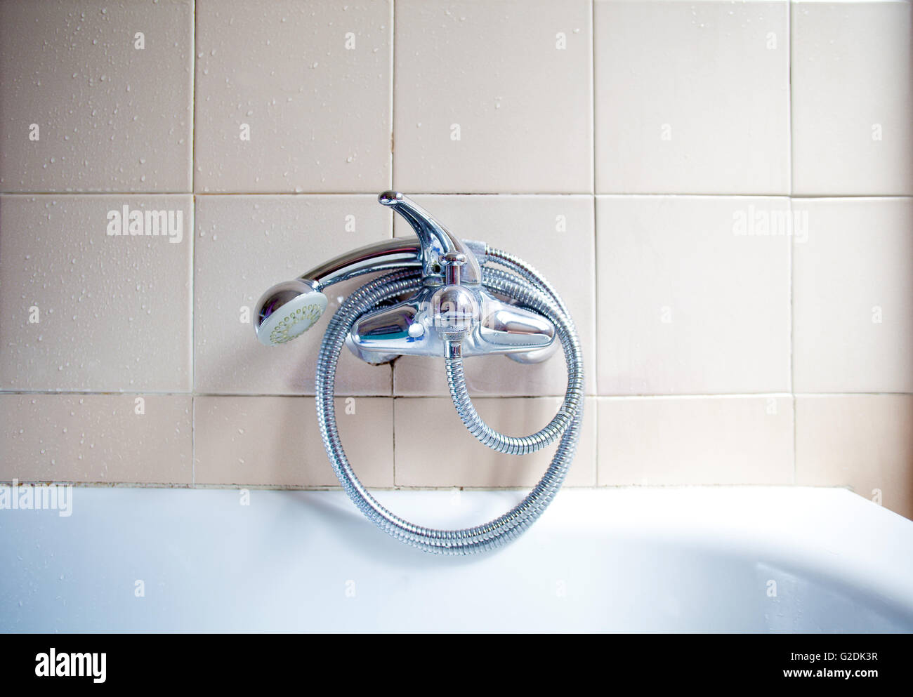 Closed shower tap in the bathroom Stock Photo - Alamy