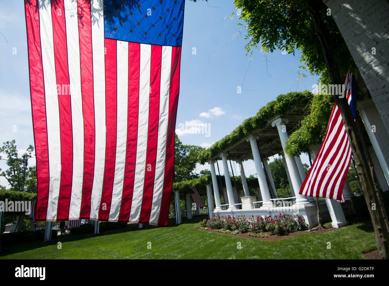 American flags hang in the Cpl. James R. Tanner Amphitheater at ...