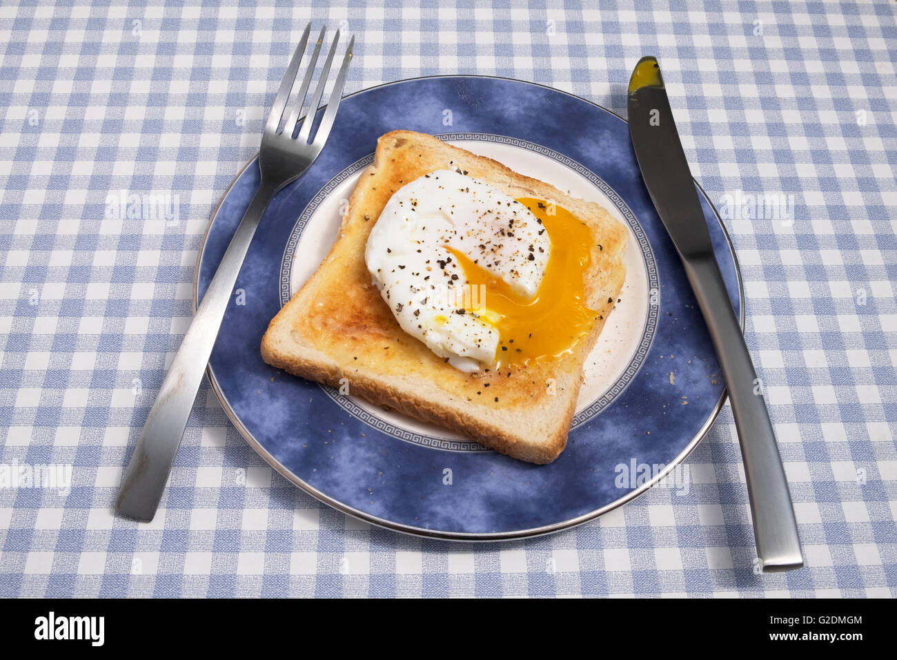 Poached egg on toast Stock Photo - Alamy