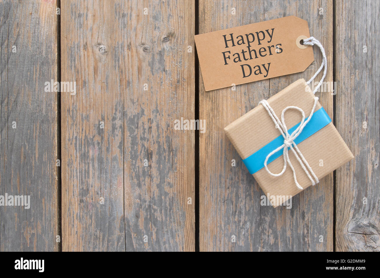 Fathers day gift over a wooden background with space Stock Photo - Alamy