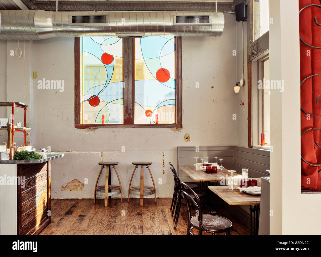 Empty Restaurant with Abstract Stained Glass Window Stock Photo - Alamy